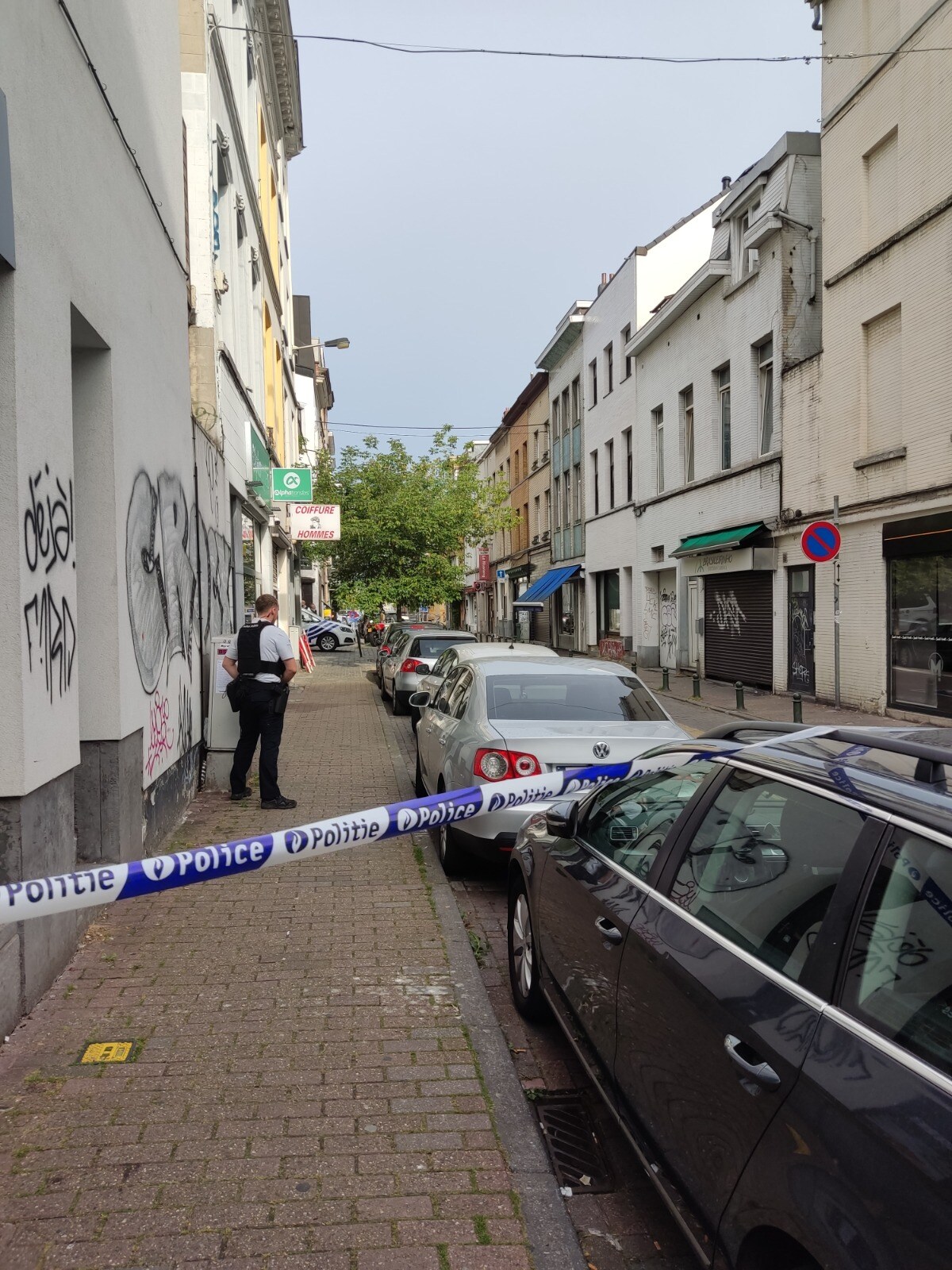 Gewapende man gearresteerd na mislukte overval op wisselkantoor | De Morgen