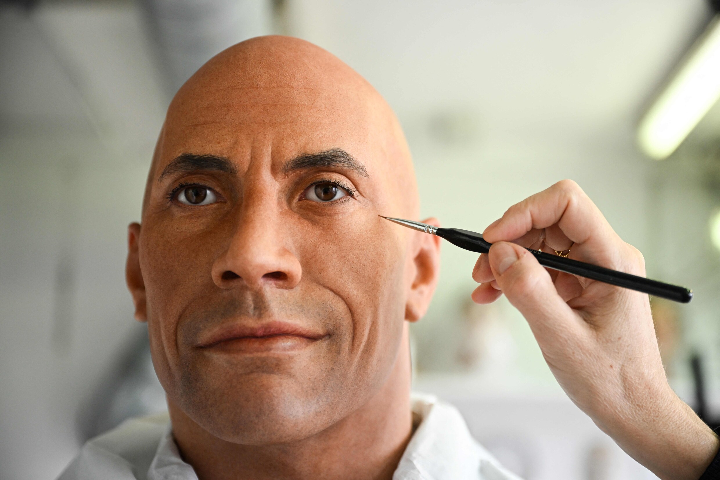 Acteur Dwayne Johnson hekelt wassen beeld | De Morgen