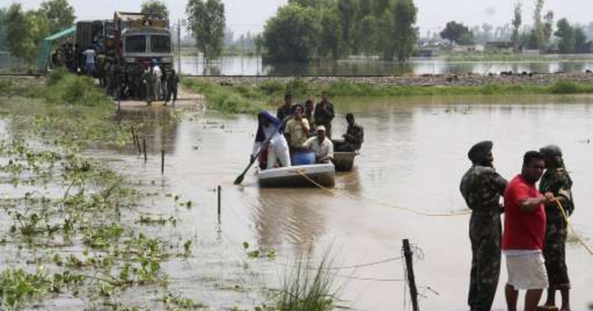 Tientallen doden bij overstromingen na moessonregens in India | De Morgen