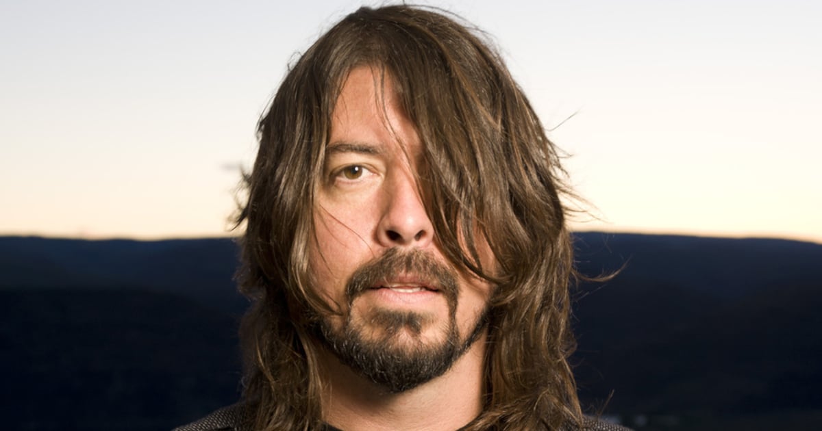Dave Grohl in zee met zanger Corey Taylor van Slipknot | De Morgen